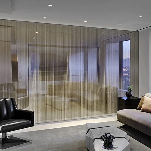 Custom wire mesh laminated glass solution for commercial office space