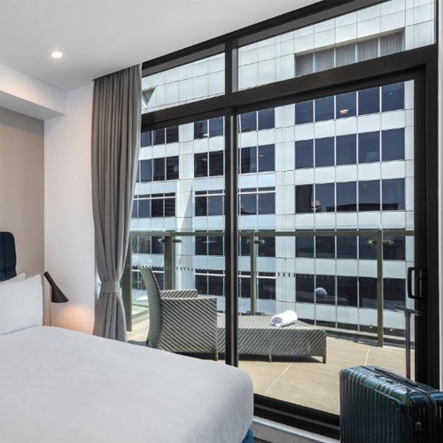 Hotel room sliding aluminum glass door in Meriton Suites Sydney ...