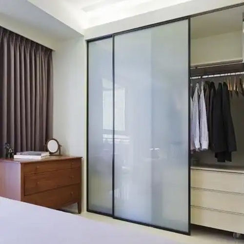 Sliding dresser closet door by private frosted glass panel