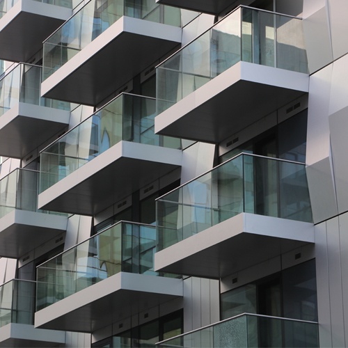 framed balustrade with clear laminated glass infil panel
