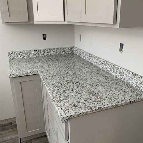 kitchen countertop with economic light grey granite