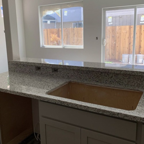kitchen countertop with economic light grey granite