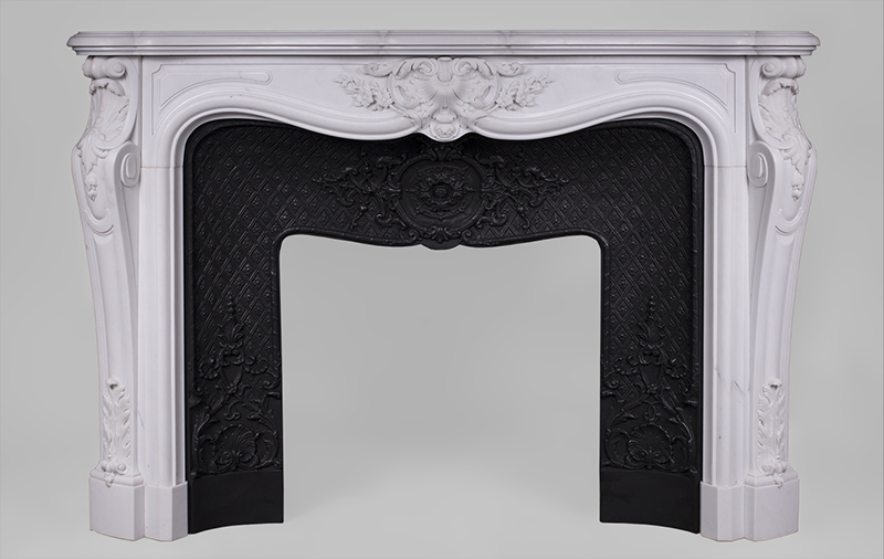 custom made marble fireplace with ornaments of louis XV style